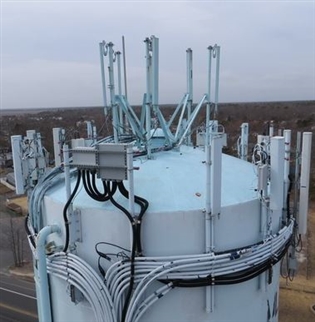 How easy is it to deploy antennas on a water tank? (Cell Tower Builds ...
